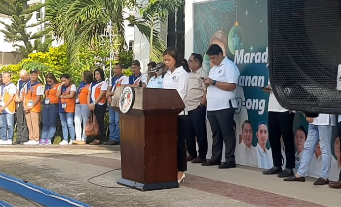 Surigao: Public Employment Service and Development Office host sa flag ...